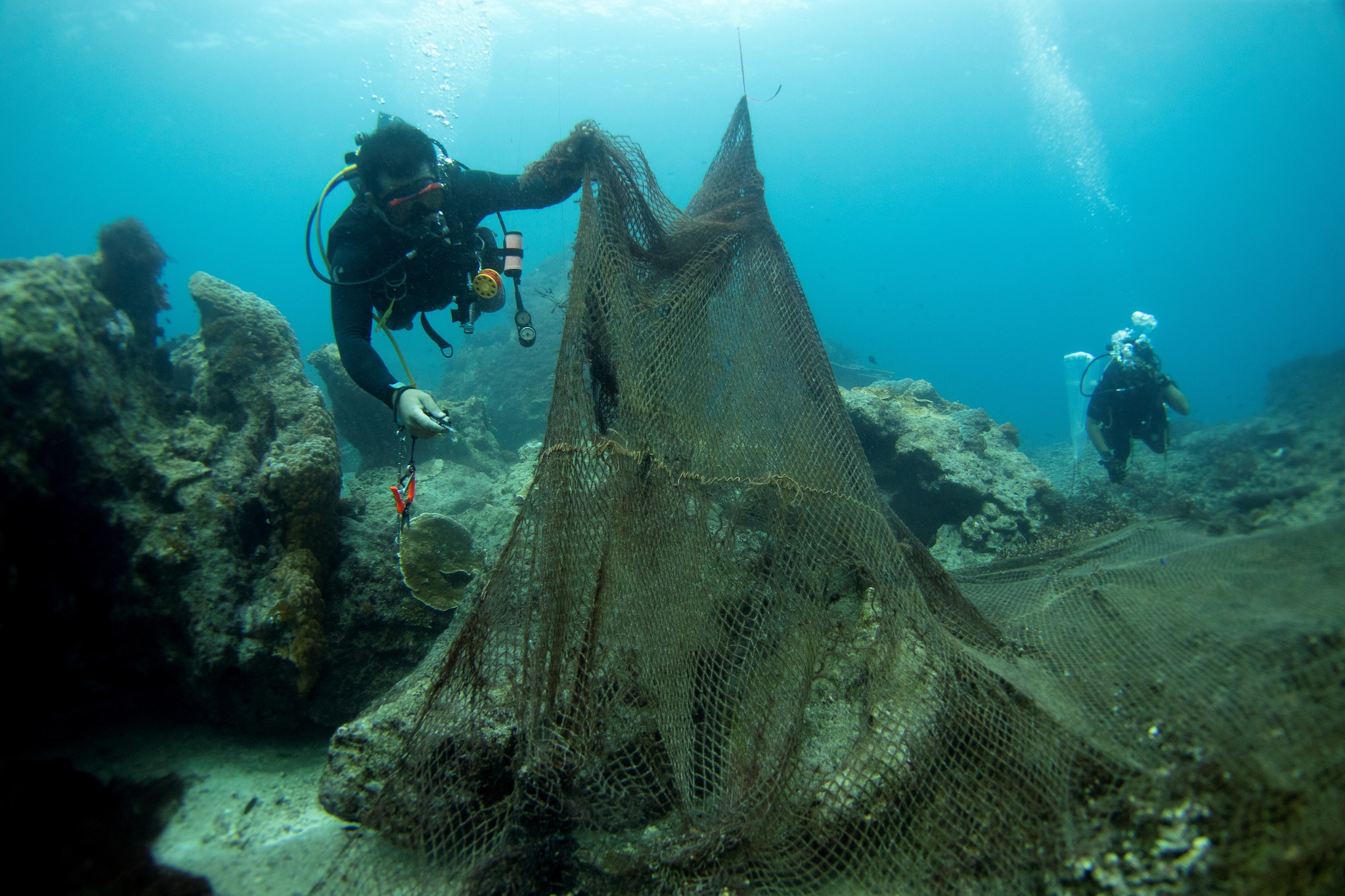 In Photos: Divers Remove Ghost Fishing Nets Threatening Coral Life in ...