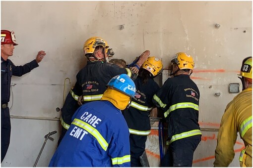Firefighters Rescue Woman Trapped Between Two Buildings in California ...