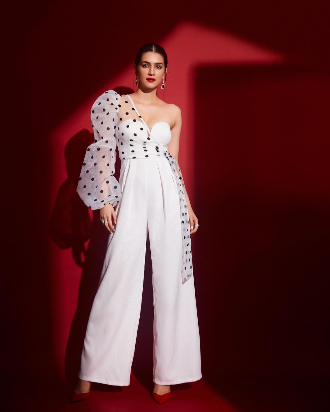 Kriti Sanon Looks Stylish In Orange Dress For Mimi Promotions See The