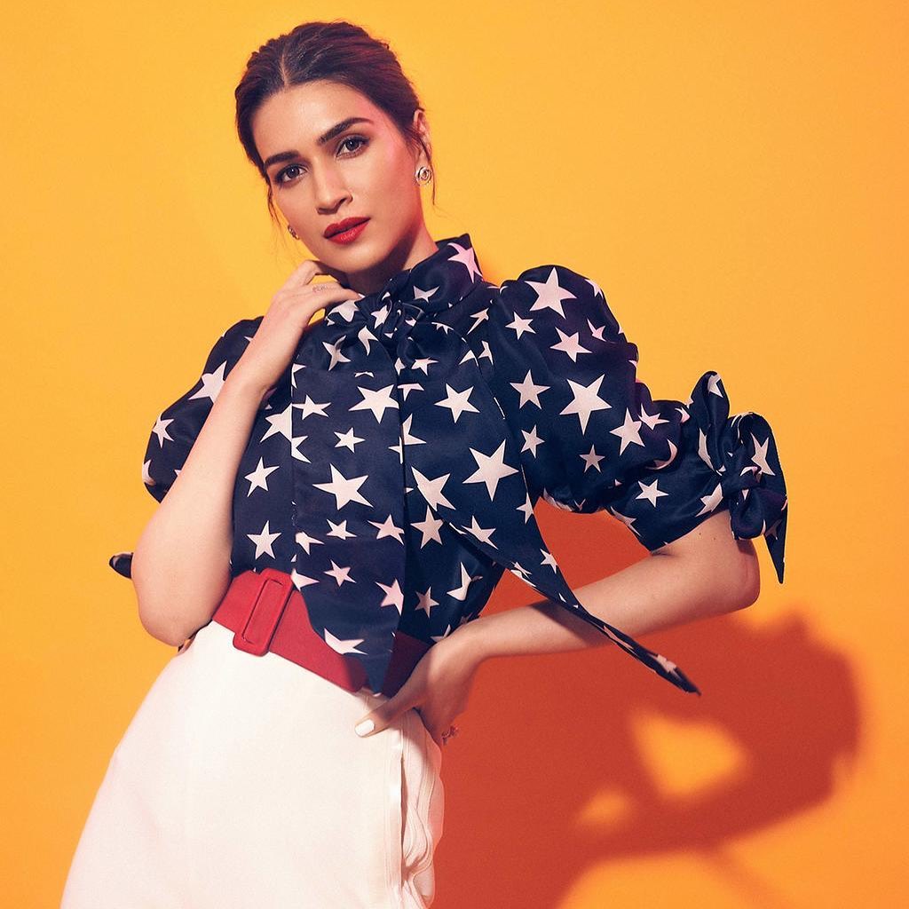 Kriti Sanon Looks Stylish In Orange Dress For Mimi Promotions See The