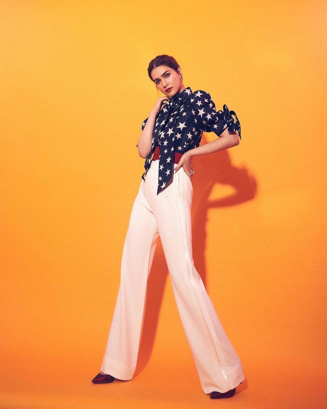 Kriti Sanon Looks Stylish In Orange Dress For Mimi Promotions See The