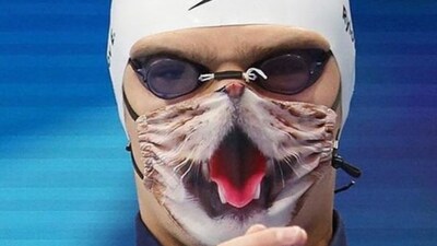 Olympic Swimmer Wears Cat Face Mask While Receiving Gold Medal | Buzz ...
