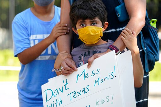 EXPLAINER: Texas Mask Battle Looks To Courts For Resolution