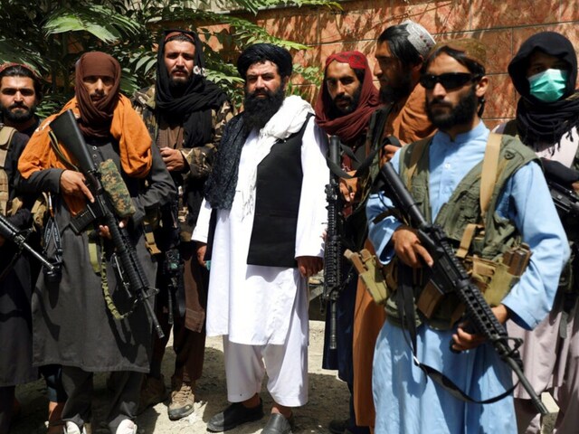 Videos Show Taliban Pose With American Arms, Choppers, Uniforms ...