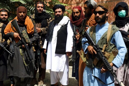 Videos Show Taliban Pose With American Arms, Choppers, Uniforms ...