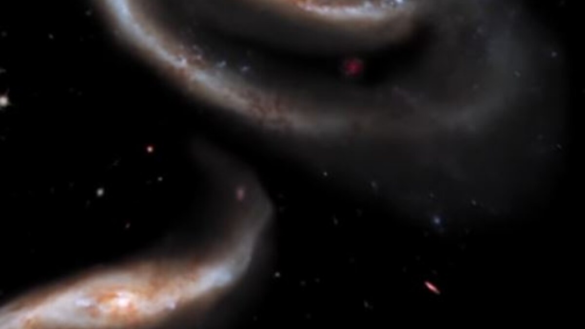 WATCH: NASA Shares Visuals of Two Galaxies Forming 'Cosmic Rose' - News18