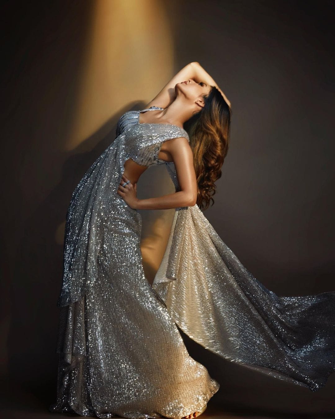 Mouni Roy Oozes Oomph In A Shimmery Saree And Plunging Neckline, See ...