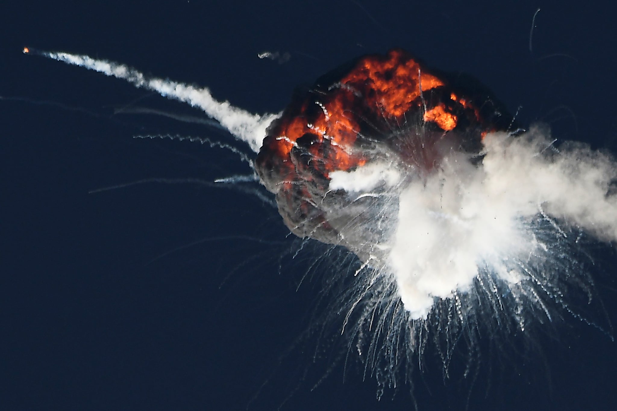 In Photos: Rocket Explodes Over Pacific Ocean in Massive Fireball ...