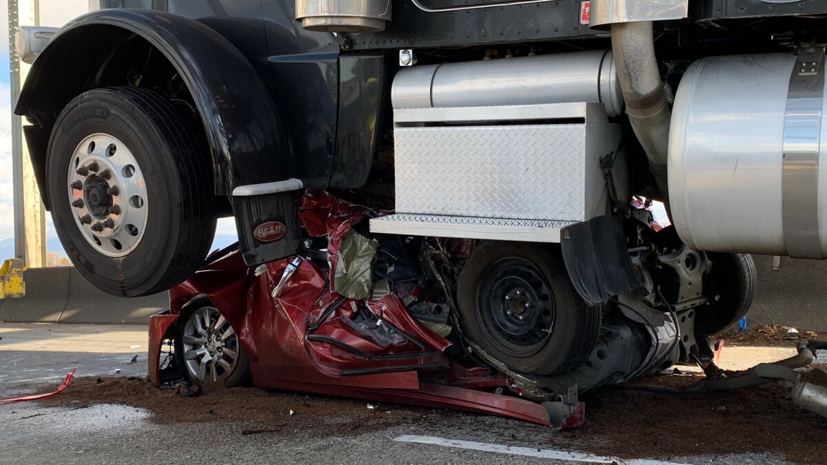 US Woman Miraculously Walks Out of Car After Semi-truck Collision Folds ...