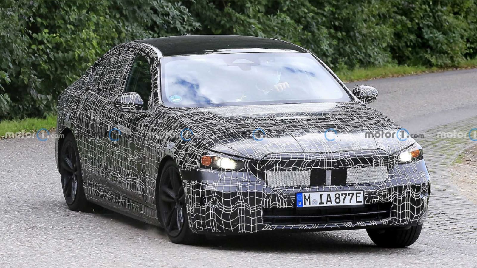 New BMW i5 Electric Sedan Prototype Spotted Testing With Heavy Disguise ...