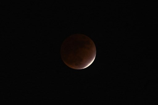 In Pics: Historic Partial Lunar Eclipse 2021 Around The World - News18