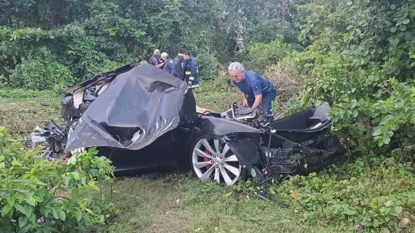 Tesla Model S Falls Off Cliff, Rolls 100 Feet Down; Driver Escapes With ...