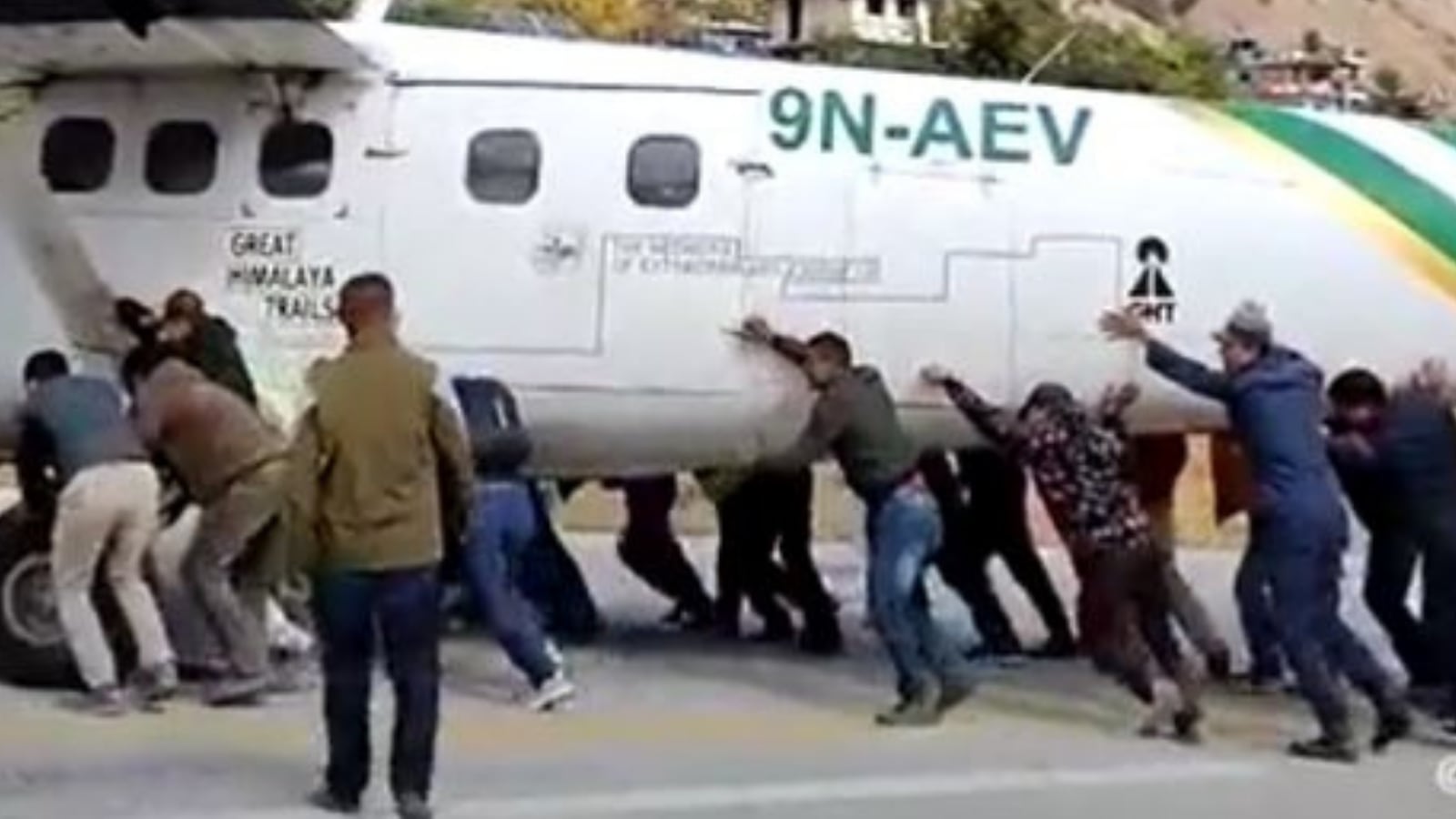 WATCH: Passengers Push Aircraft off Nepal Runway in Viral Video | Buzz ...
