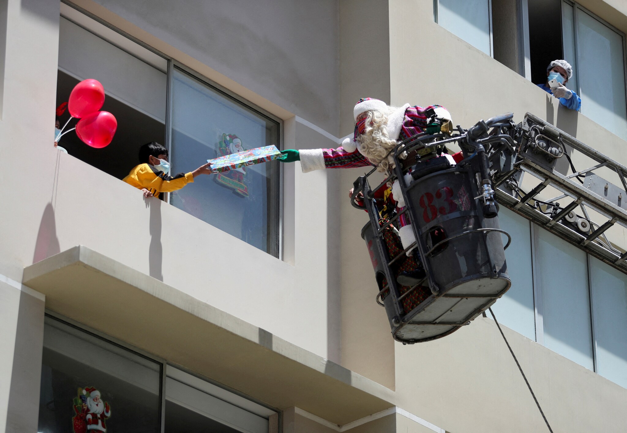 In Photos: Superheroes Turn Santa, Simba's Birthday Meat Cake and Other ...