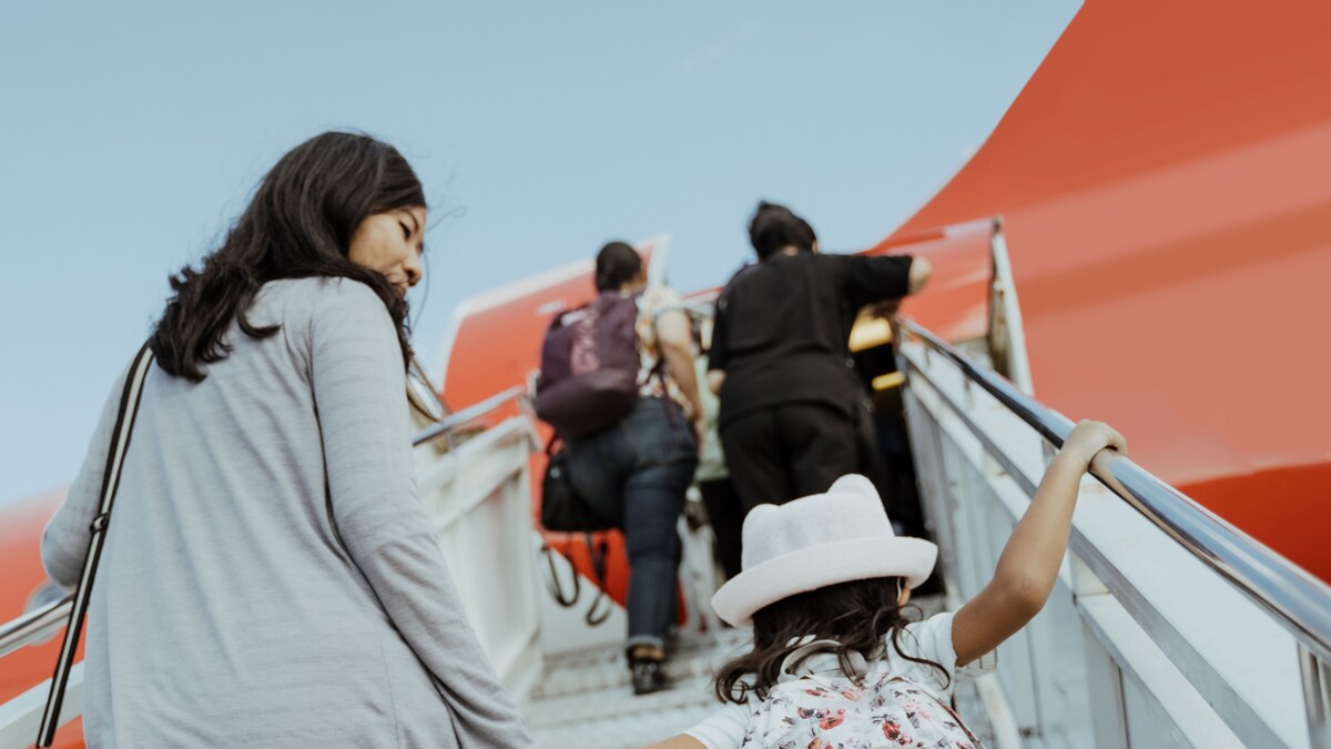 Some Airlines Use Stairs to Board Passengers While Others Have Air ...