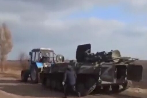 WATCH: Ukrainian Farmer Tows Away Russian Tank Using a Tractor in Viral ...