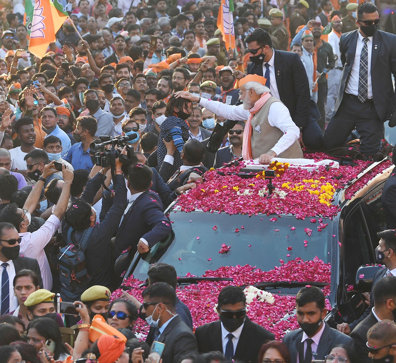 UP Polls Phase 7: PM Modi Holds Mega Roadshow in Varanasi, Offers Prayers at Kashi Vishwanath ...