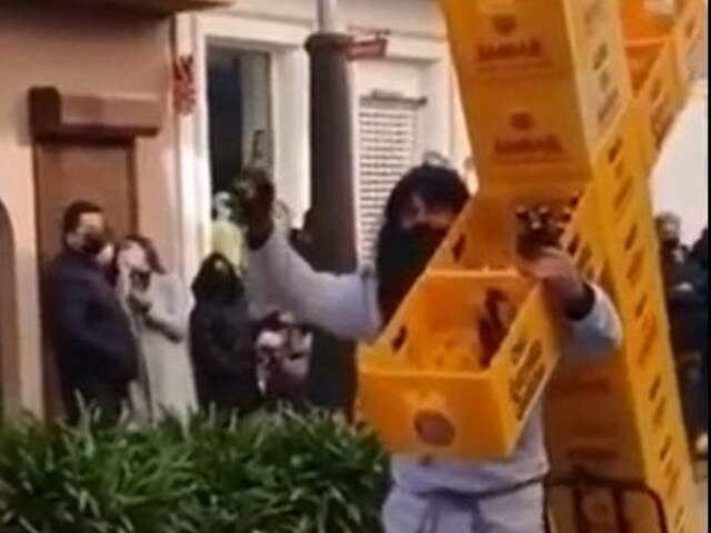 Man Dressed as Jesus Christ Seen Dragging Cross Made Out of Beer Crates ...