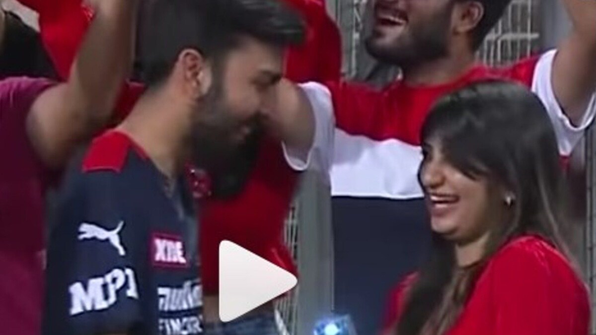 Proposal with a Twist! - Girl Proposes to RCB Fan During CSK vs RCB IPL 2022 Match - News18