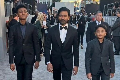 Dhanush Rocks A Mullet On The Gray Man Premiere Red Carpet But It's His Sons Who Steal The Show ...