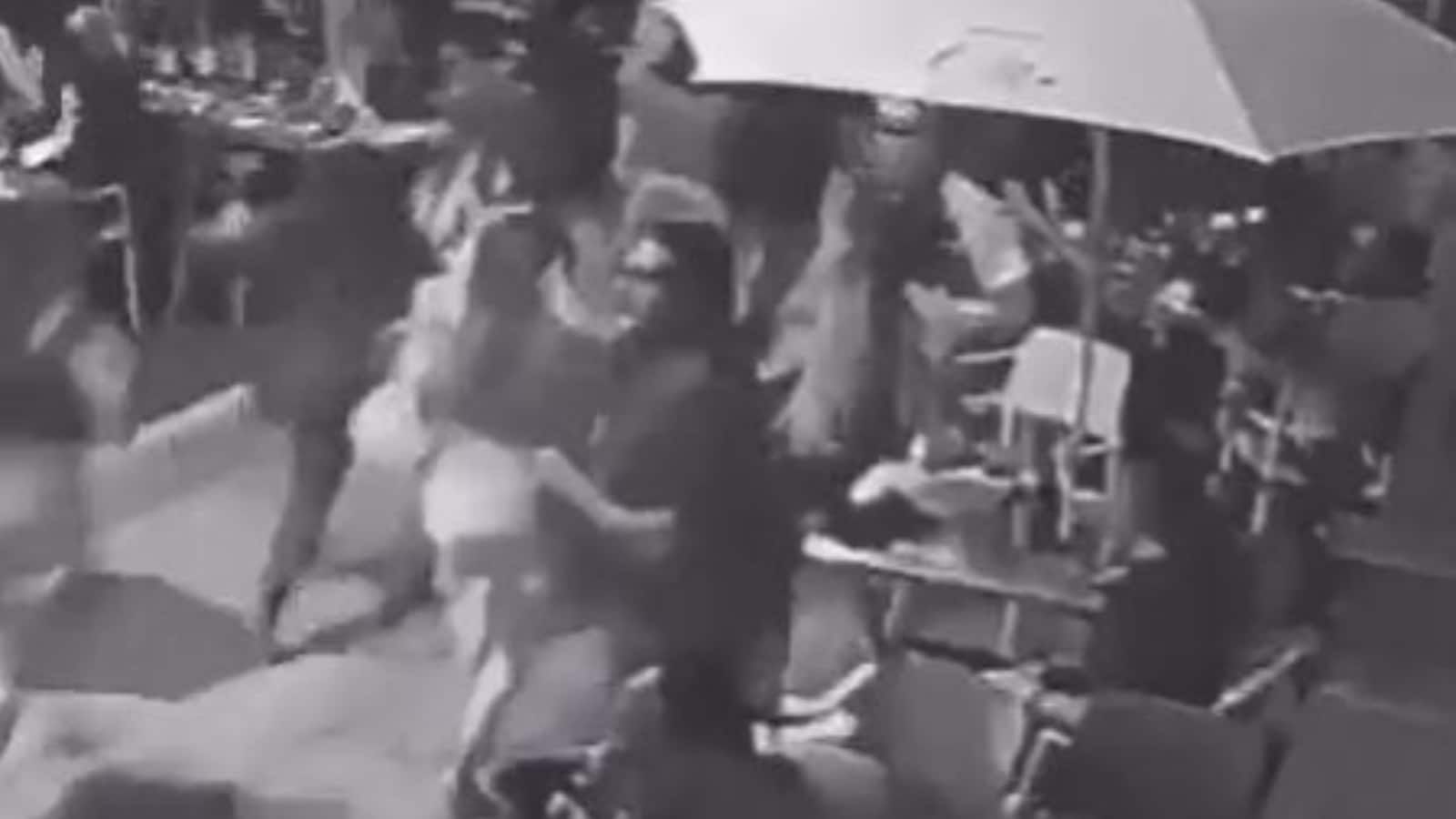 WATCH: Diners at Brazilian Bar Flee in Fear Mistaking Group of Runners ...