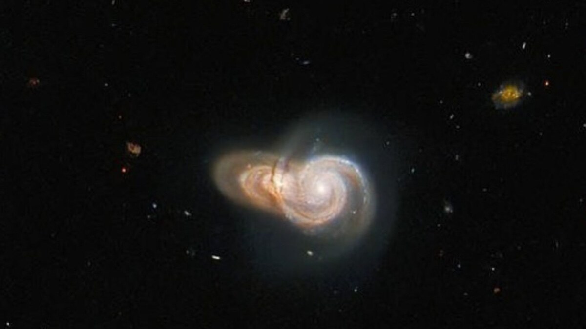 NASA Releases Stunning Image of Two Overlapping Galaxies Captured by ...