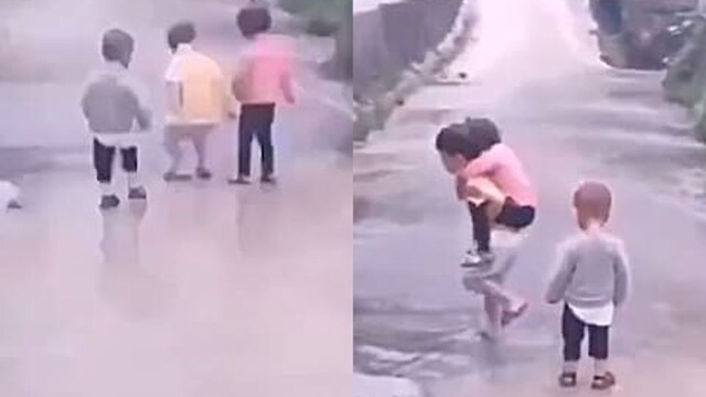 Watch: Brother Helping Siblings Cross the Waterlogged Road is the Most ...