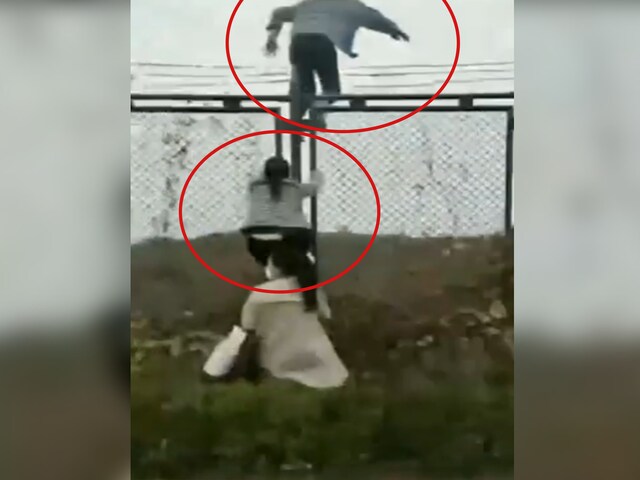 Workers at China’s Largest iPhone Factory Scale Fences to Escape Covid ...