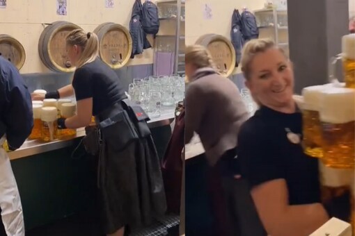 Talented Waitress Stacks 12 Beer Mugs Without Spilling a Drop, Video ...