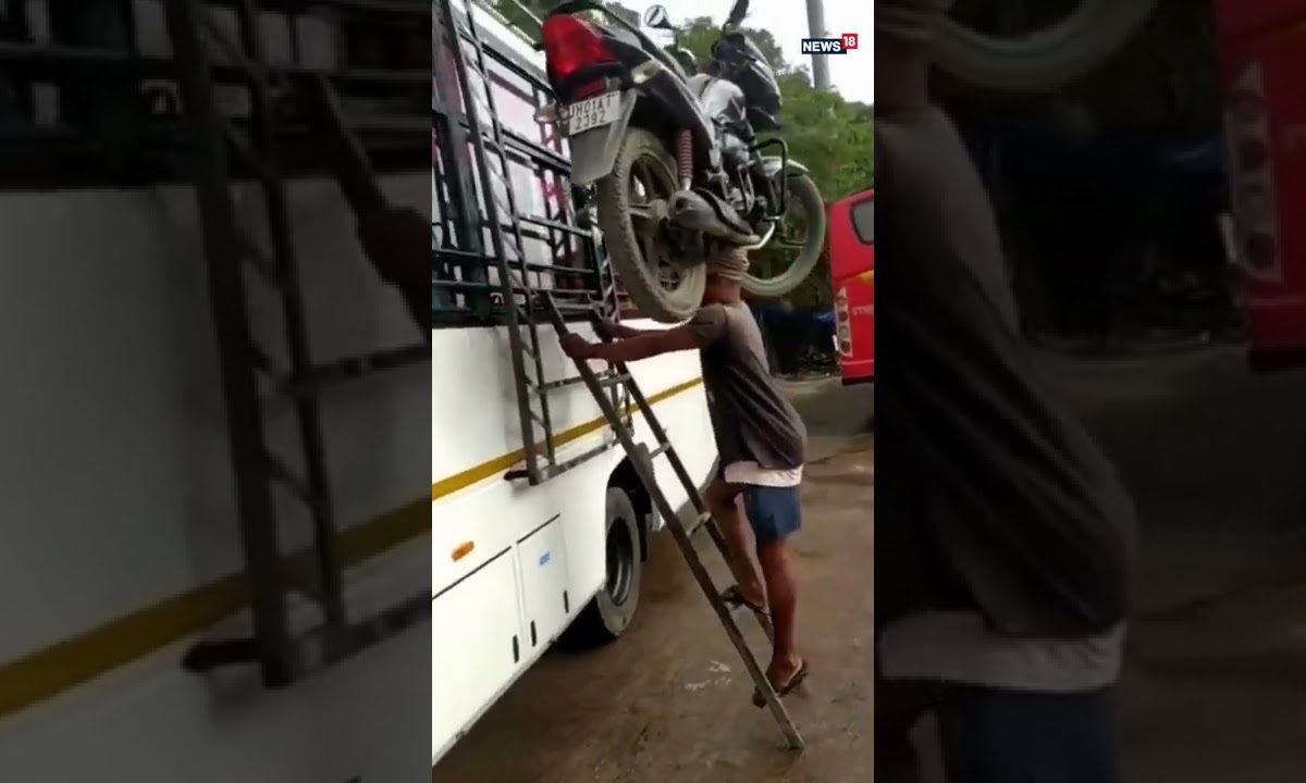 Shorts | Viral Video Of Man Carrying A Heavy Motorbike On His Head ...