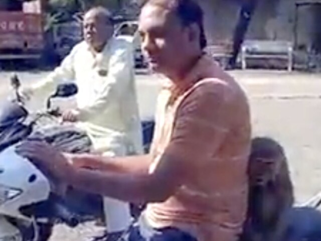 MP Man Takes Monkey to Police Station On His Scooter for Creating ...