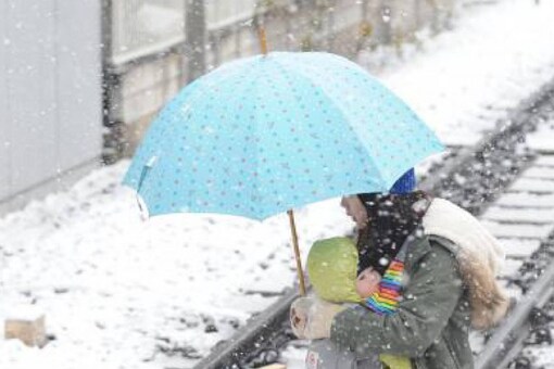 Transportation Disrupted in Japan Post Heavy Snowfall and Powerful ...