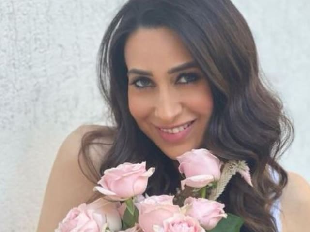 Karisma Kapoor Looks Elegant As She Poses With Pink Roses in Her Latest ...