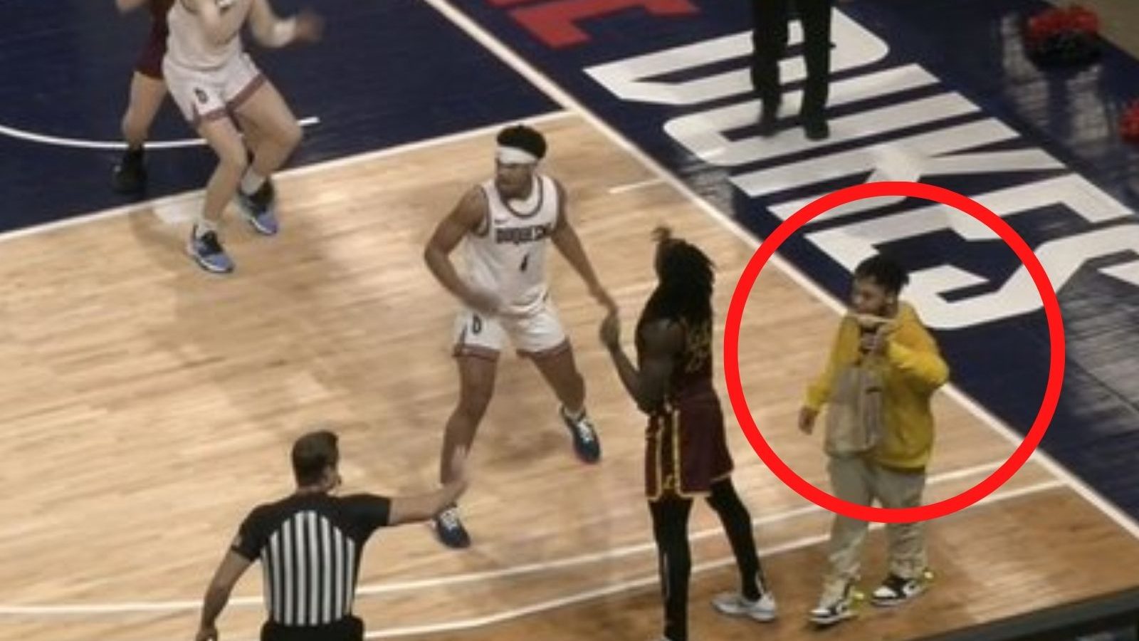 On the Ground Delivery? Food Agent Interrupts Basketball Game To Hand ...