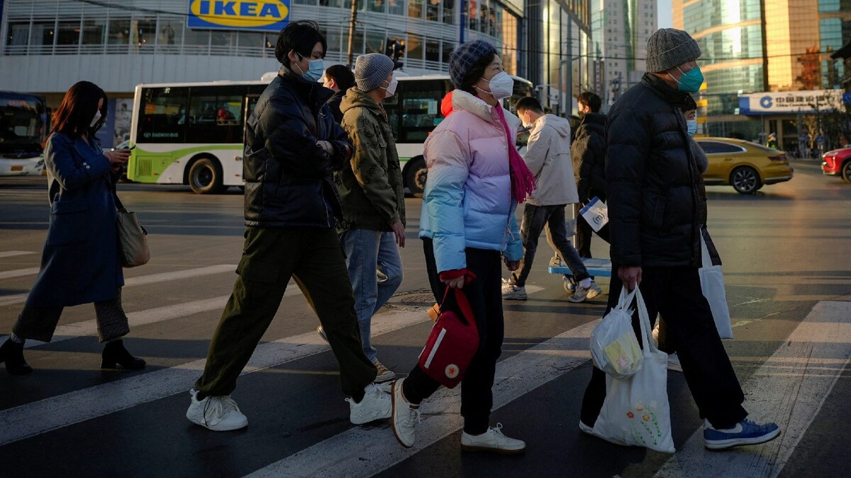 Chinese fret over elderly as WHO warns of holiday COVID surge - News18