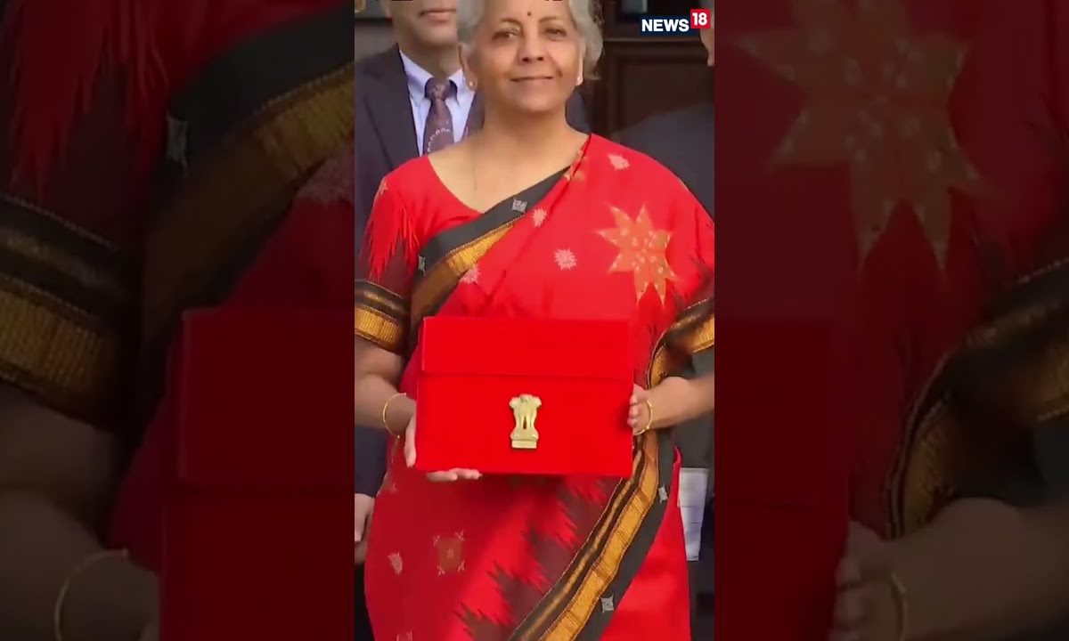 FM Nirmala Sitharaman With The All Important Digital Tablet Wrapped In ...