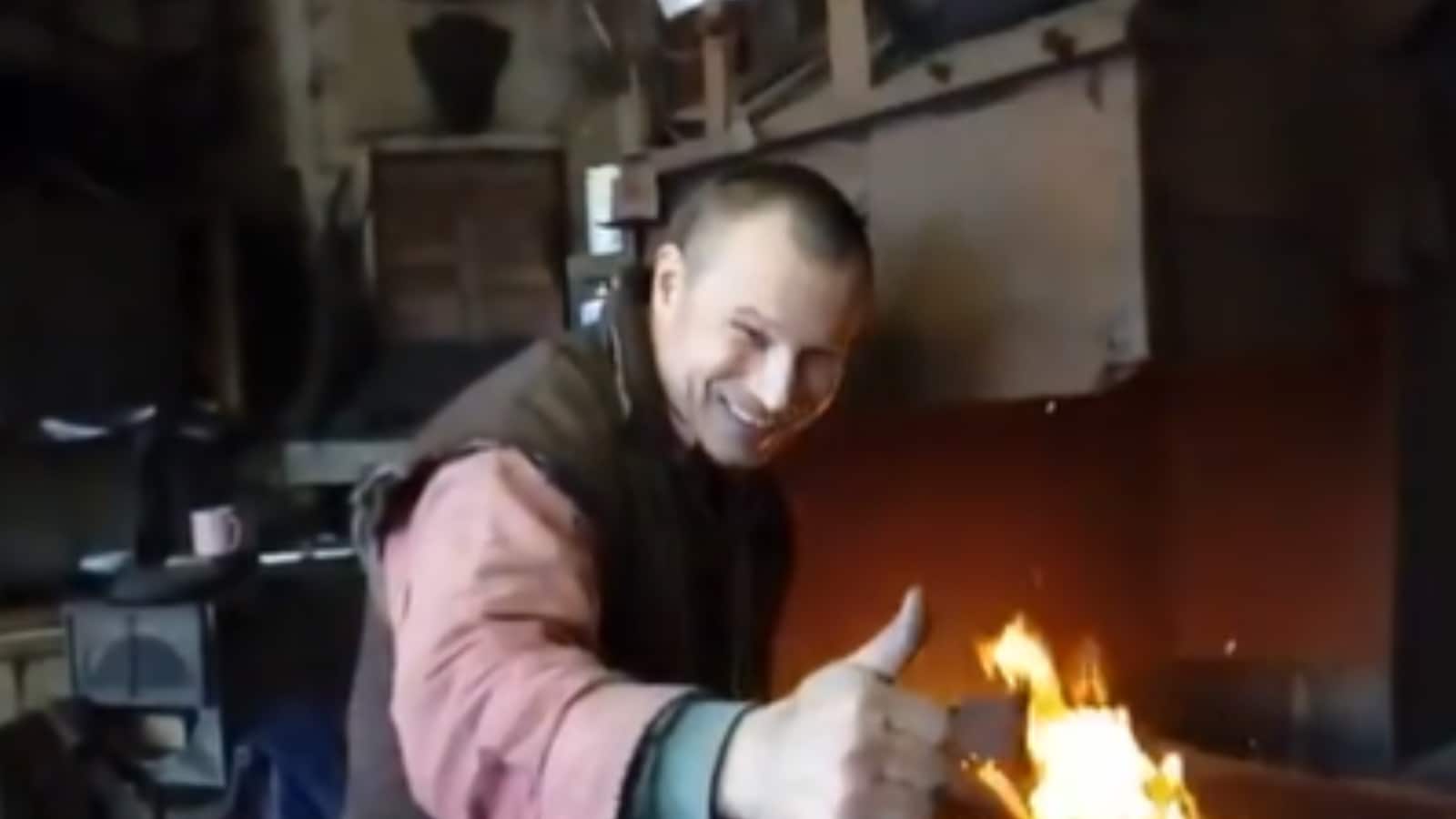 Watch: Man Ignites Fire By Striking Hammer On Steel Rod | Buzz News ...