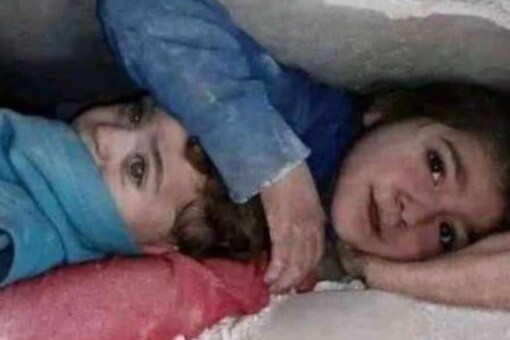Syrian Girl Protects Her Younger Brother While Being Stuck Under Rubble Both Rescued Later News18