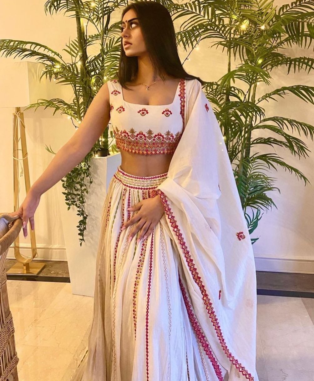 Nysa Devgn Looks Spellbinding In Red Lehenga With Deep-neck Choli ...