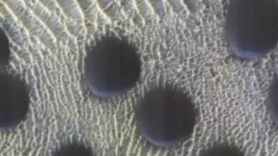 NASA Spacecraft Captures Unusual Circles of Sand Dunes on Mars | Buzz ...