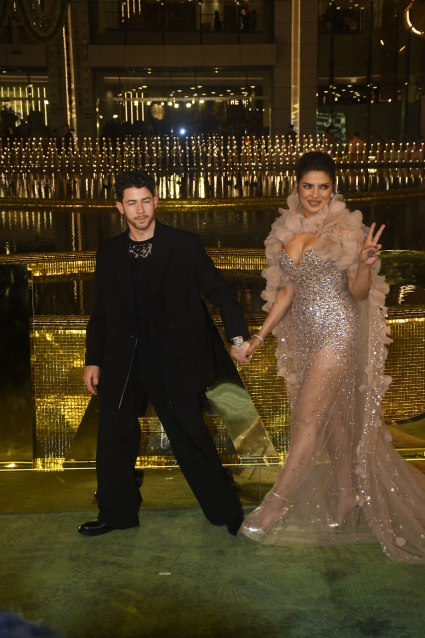 Nmacc Launch Priyanka Chopra Goes Bold Picks Sheer Gown And Cape