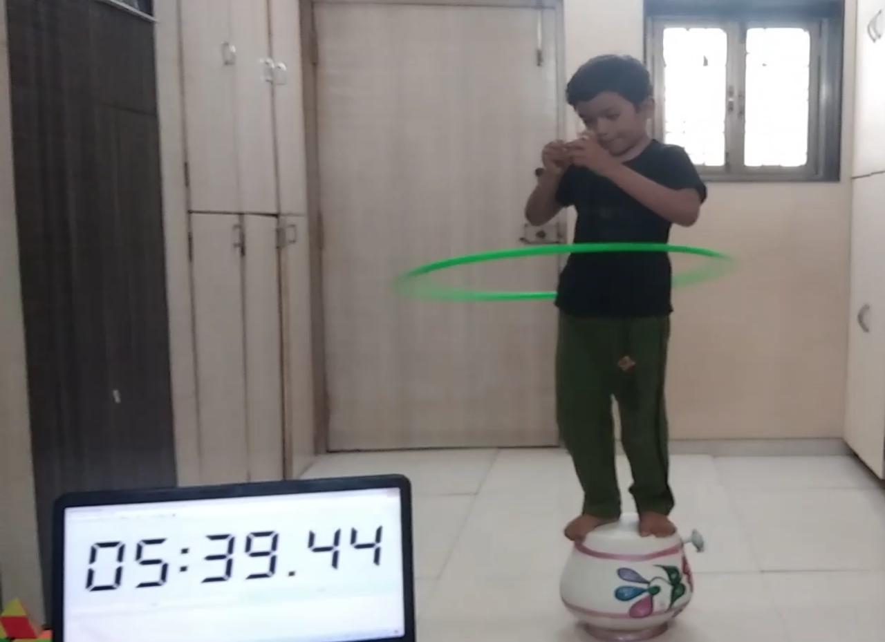 Mumbai Boy Performs Hula Hoop Spins While Standing on Inverted Earthen ...
