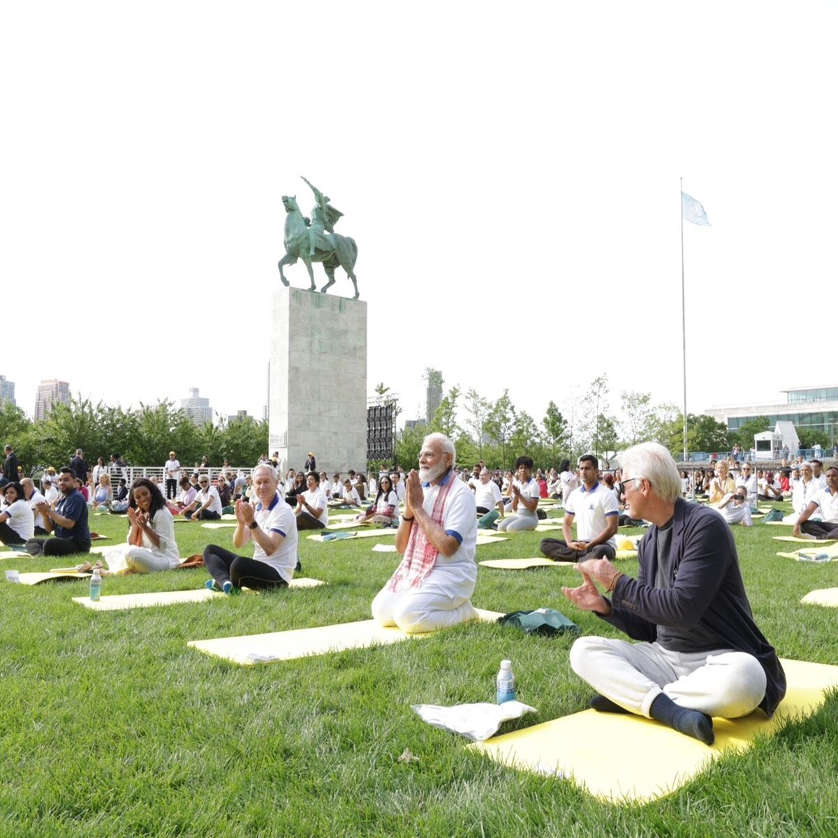 'Namaste': With Yellow Mats, White T-shirts, Hundreds Join PM Modi In ...