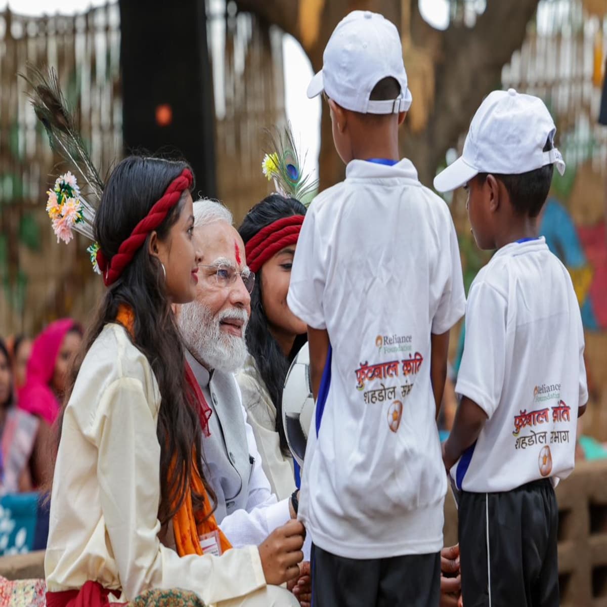 In Pictures: PM Modi Interacts With Tribal Leaders, Young Football ...