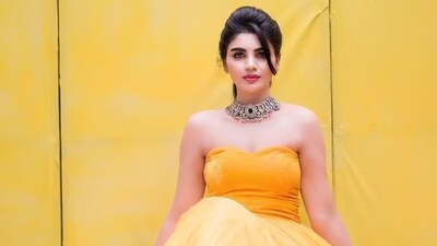 Actress Varsha Steals The Show In Her Vibrant Yellow Tulle Gown ...