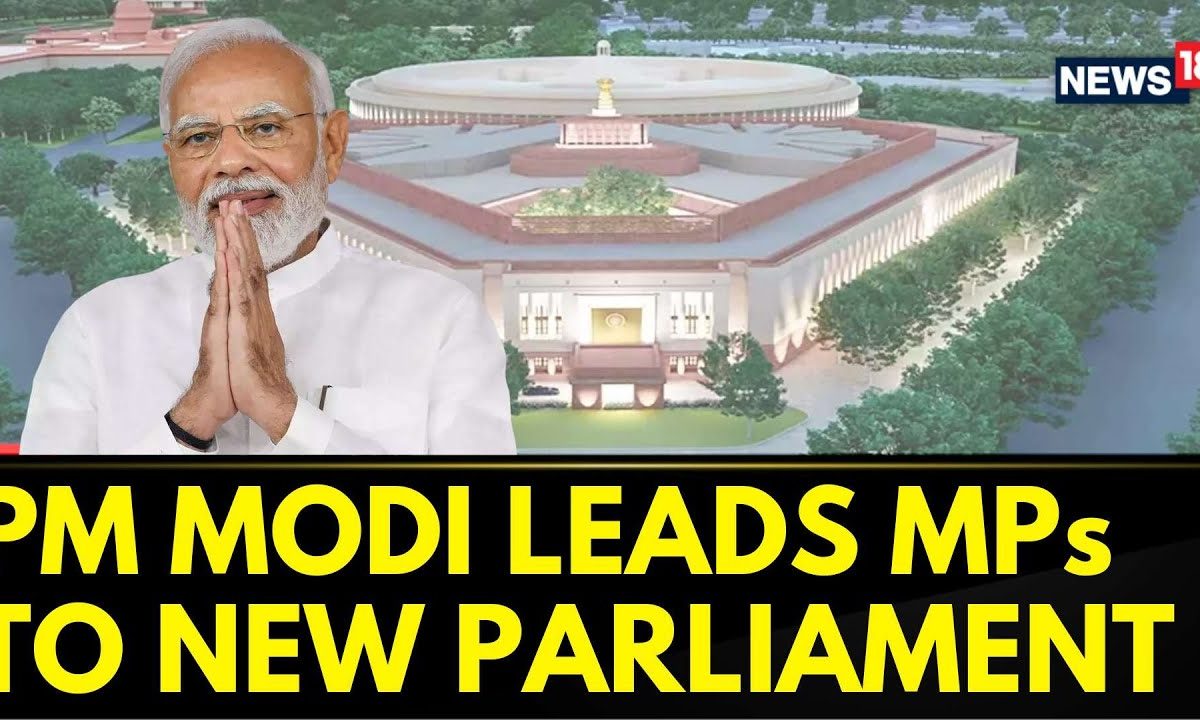 PM Modi Leads Members Of Parliament To The New Parliament Building ...