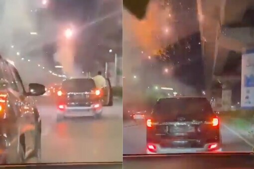 Gurugram Man Bursts Crackers While Leaning Out From Moving Car, 'Sparks ... Gurugram Man Bursts Crackers While Leaning Out From Moving Car, 'Sparks ...