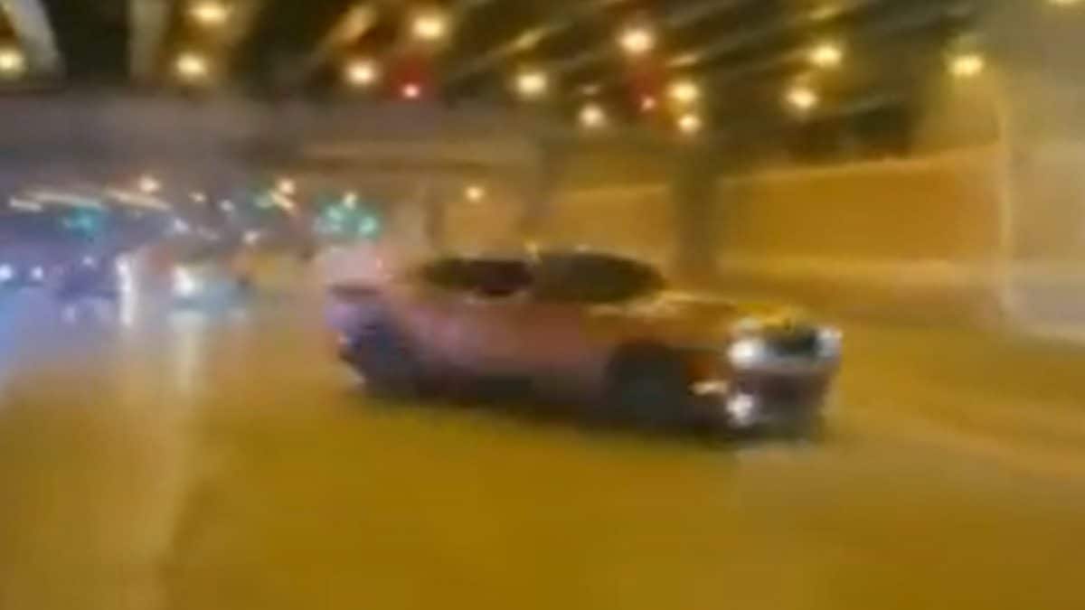 Flash Mob Attacks Tesla Car In Chicago, Damages Car Windows, Side-View ...