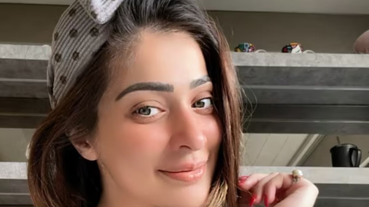 Actress Raai Laxmi Looks Stunning In White Crop Shirt And Thigh-high ...