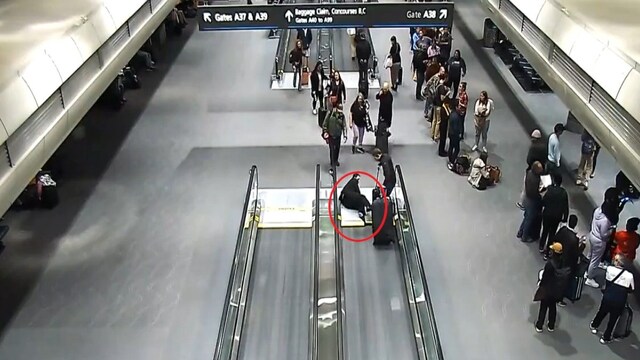 Watch | Pilot Sustains Injuries as Denver Airport Walkway Swallows His ...
